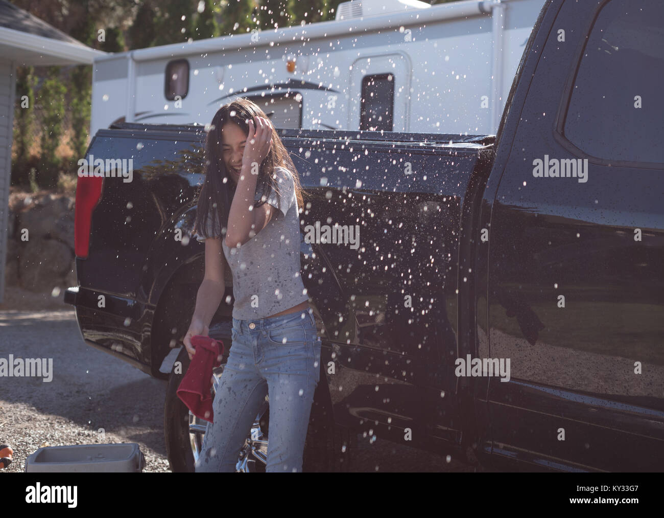 Teenager washing car hi-res stock photography and images - Alamy