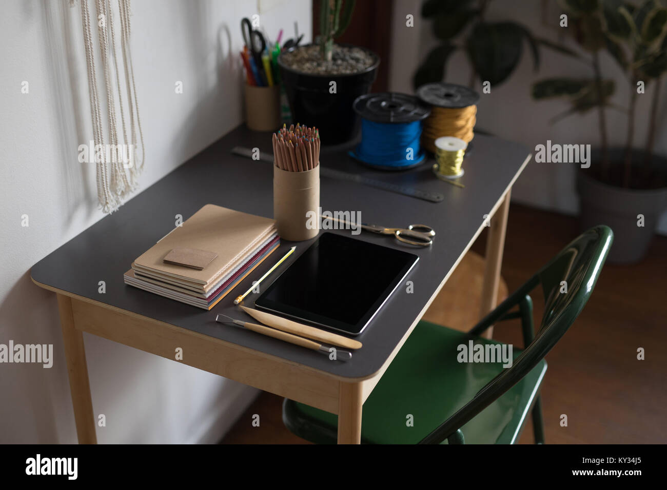 Digital tablet and stationery on table Stock Photo - Alamy