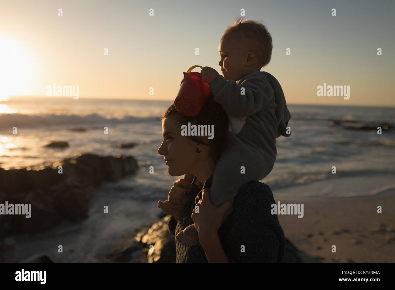 Mother and son having fun at beach Stock Photo - Alamy