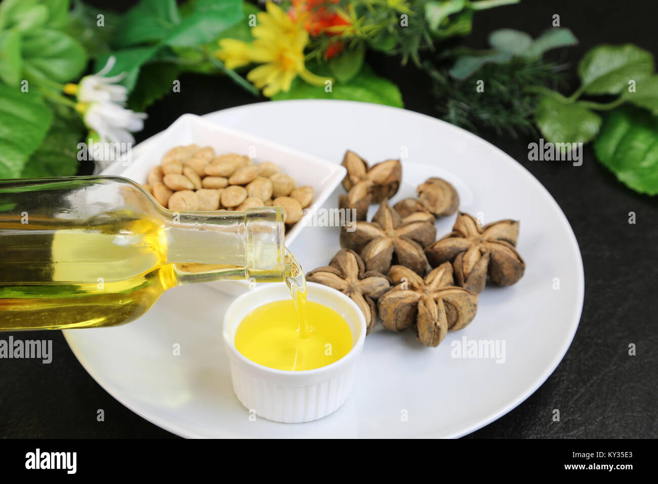Green nuts oil Stock Photo - Alamy