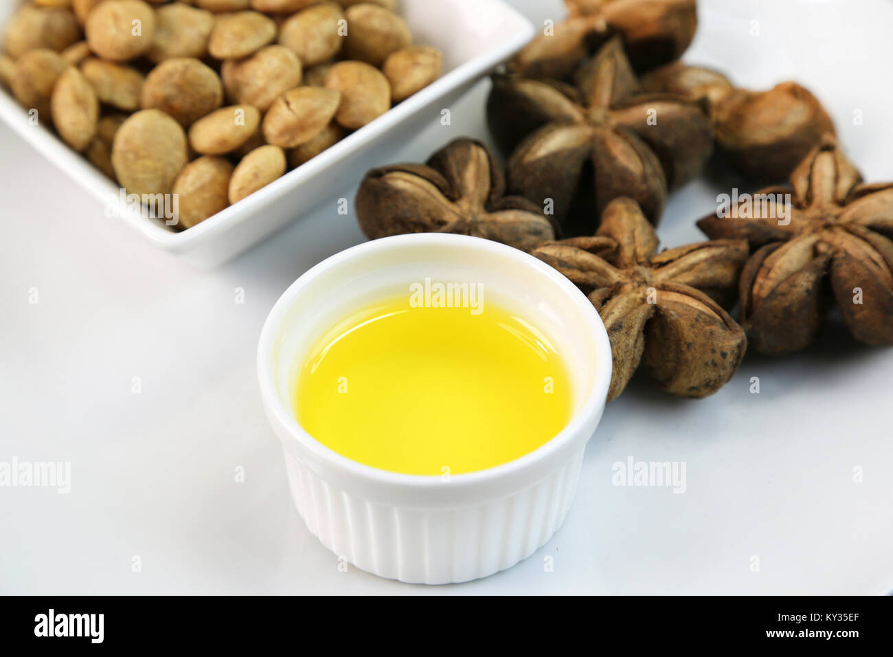 Green nuts oil Stock Photo - Alamy