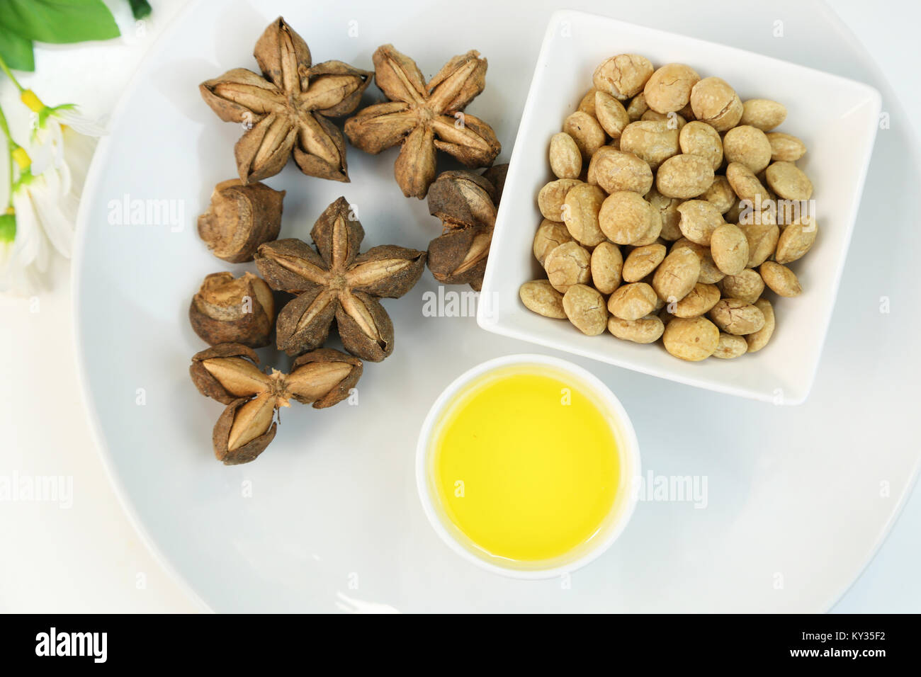 Green nuts oil Stock Photo - Alamy