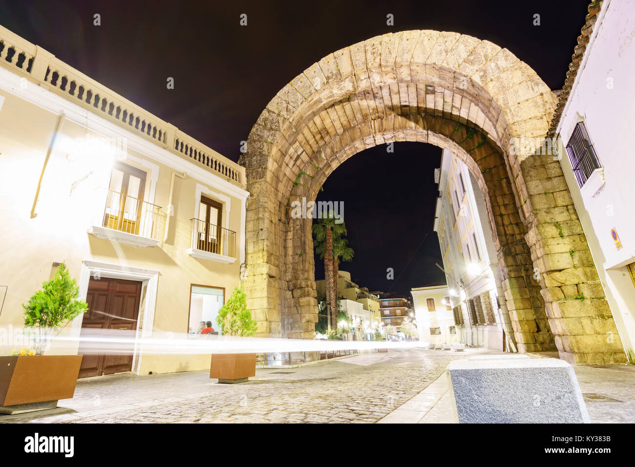 Trajano Arch at night with car lights in Merida Stock Photo - Alamy