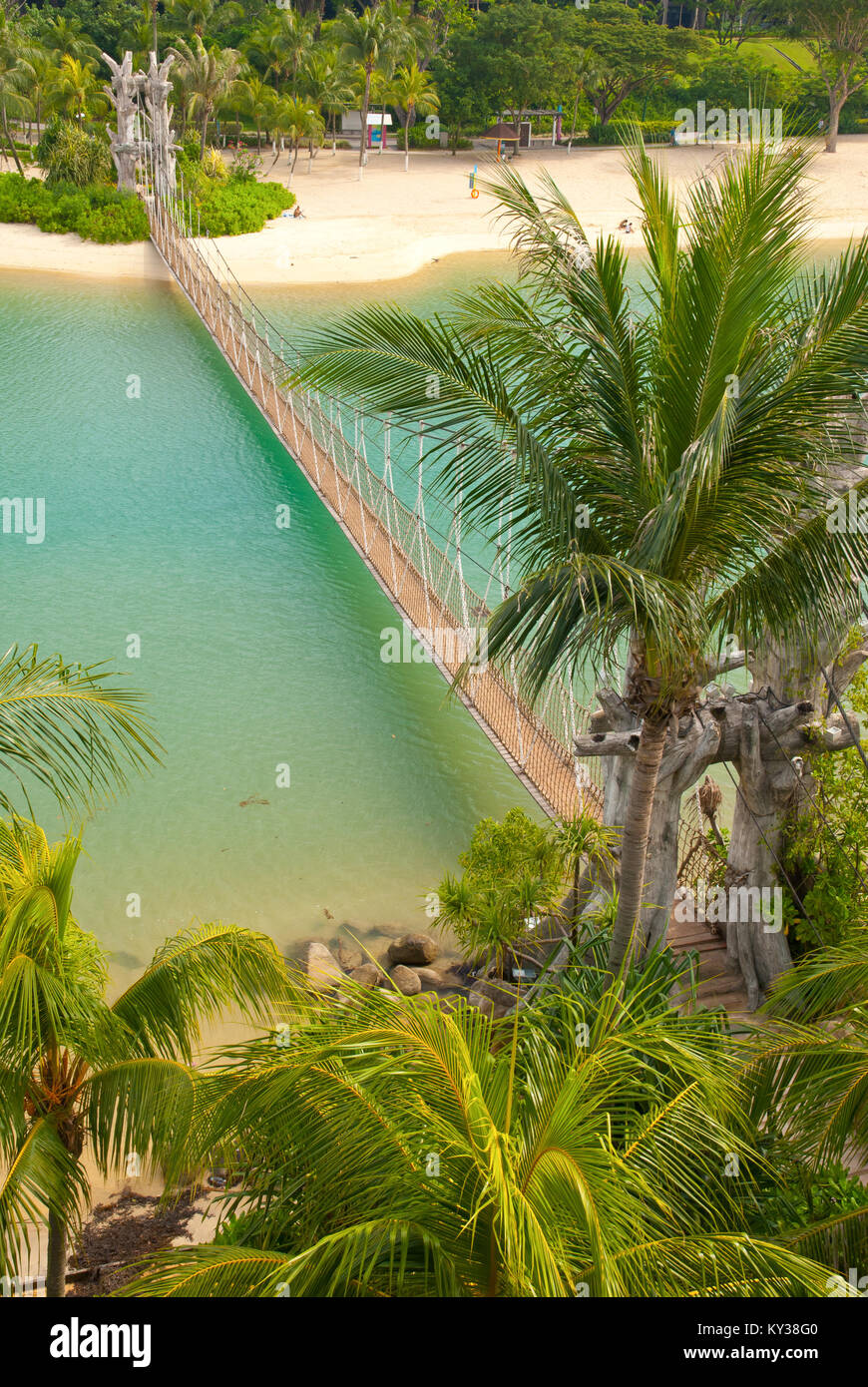 Top down view of wooden suspension bridge leading to beautiful resort ...