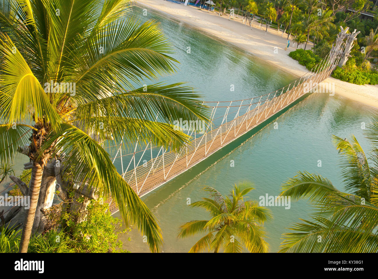 Top down view of wooden suspension bridge leading to beautiful resort ...