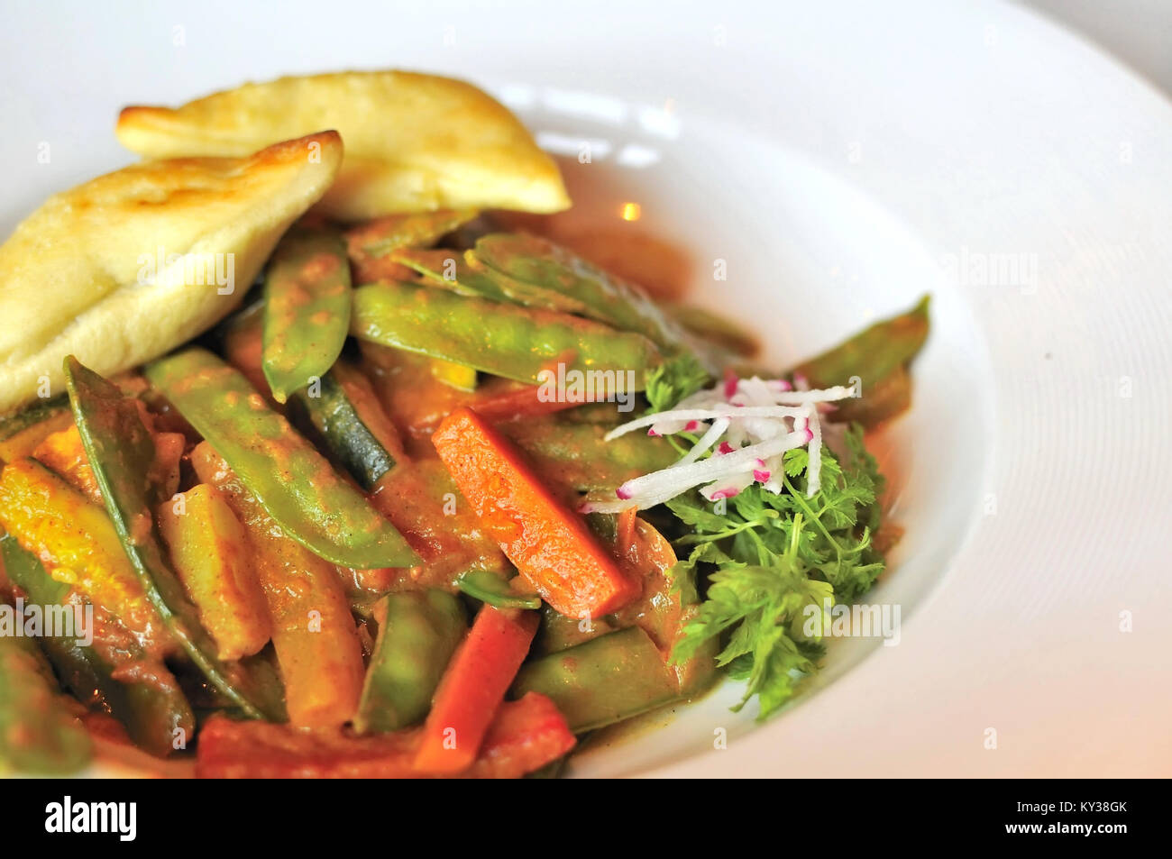 Spicy, mixed vegetable cuisine cooked Indian style with curry spices ...