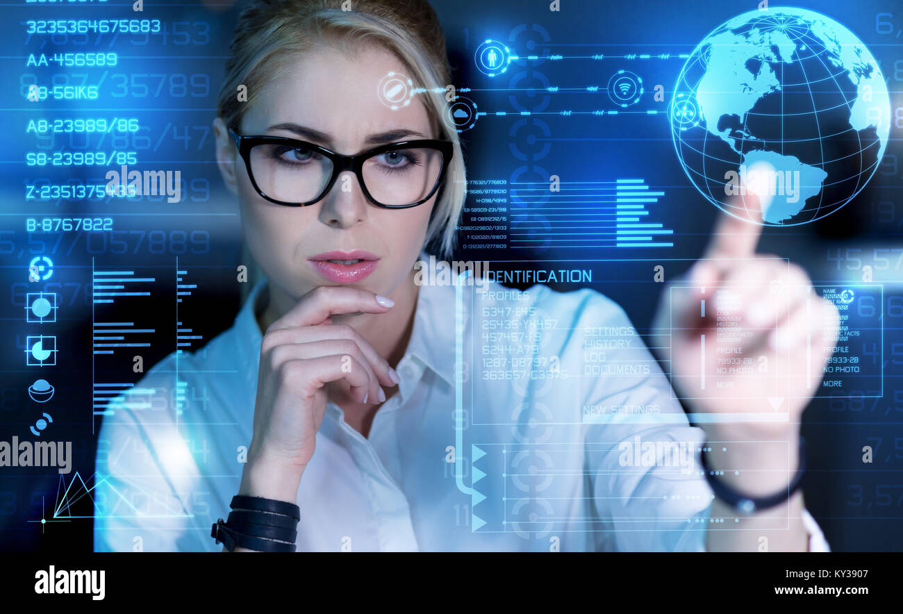 Serious programmer touching her chin while thinking Stock Photo - Alamy Serious programmer touching her chin while thinking Stock Photo - Alamy