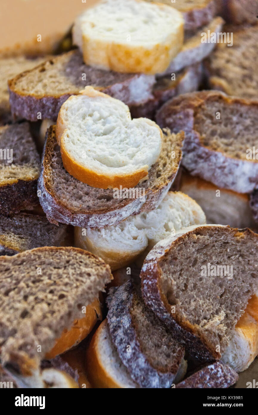 Many bread slices of various made, graham, whole-wheat, white Stock ...