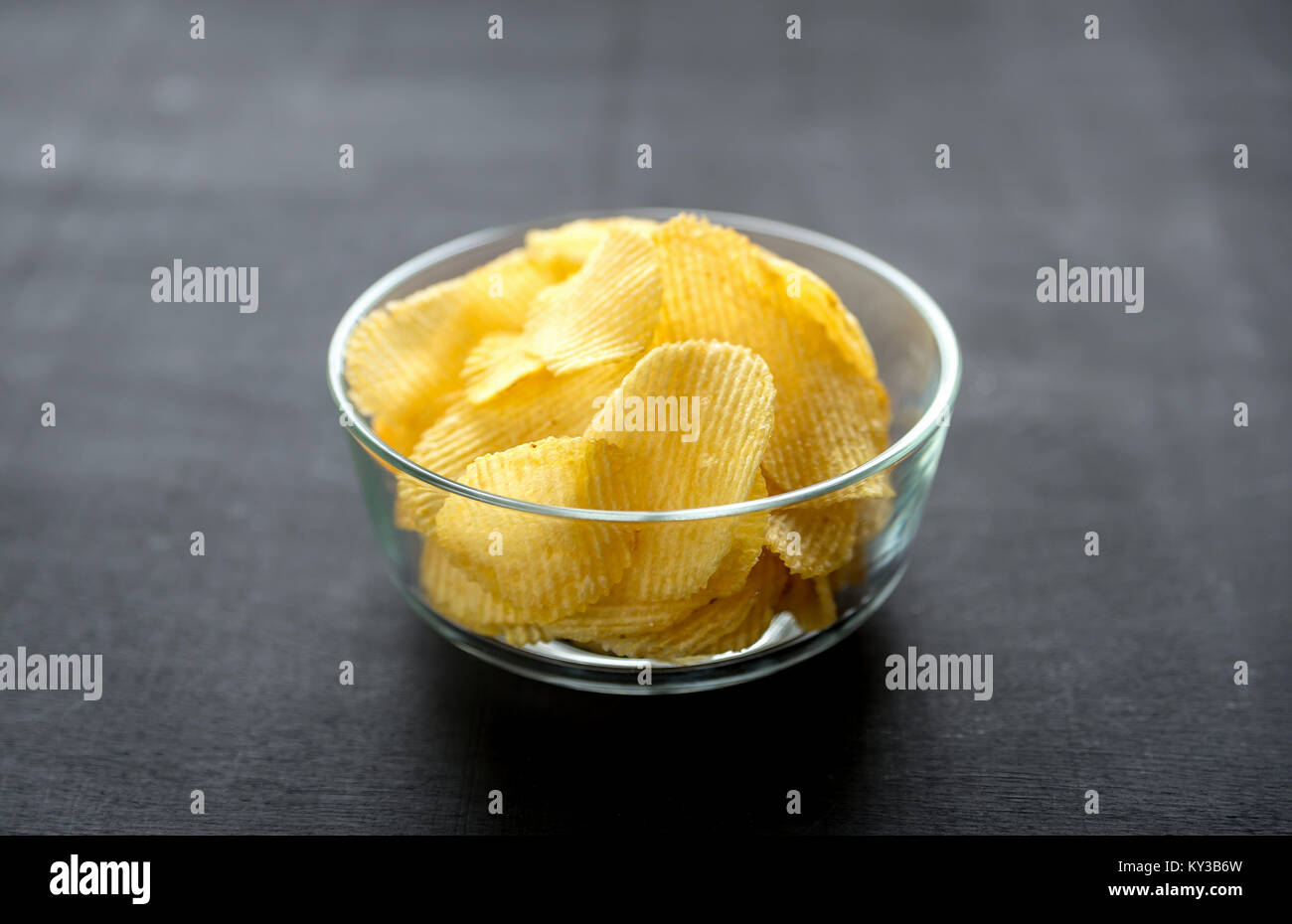 Potato chips in the glass bowl Stock Photo - Alamy