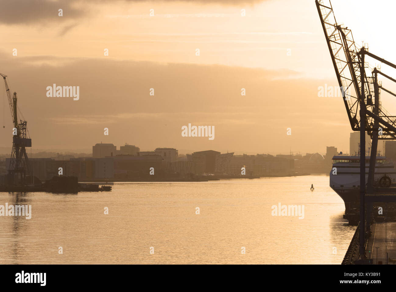 belfast heabour at sunset Stock Photo - Alamy