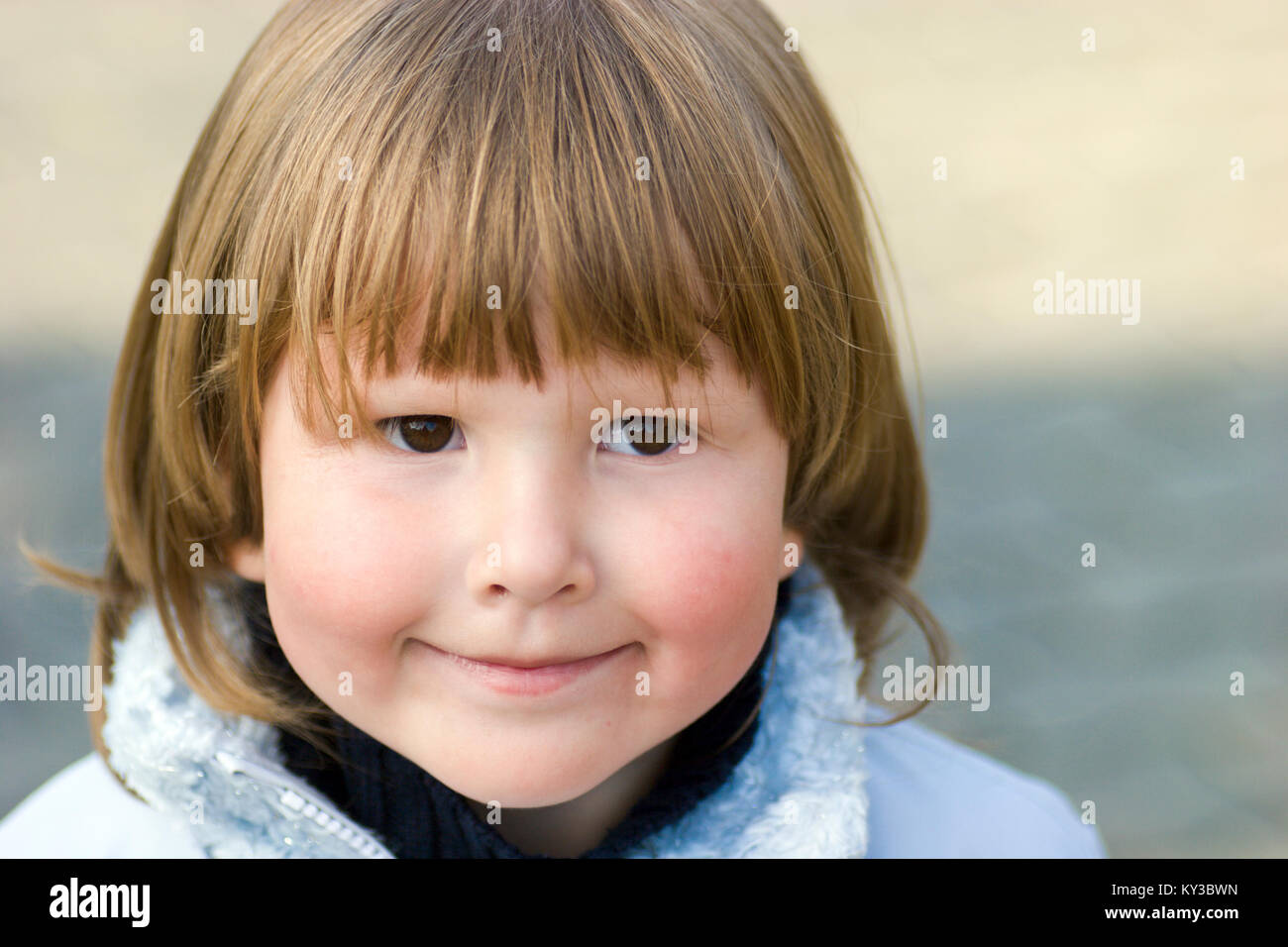 Close-up portrait of happy smiling kid outdoors Stock Photo - Alamy
