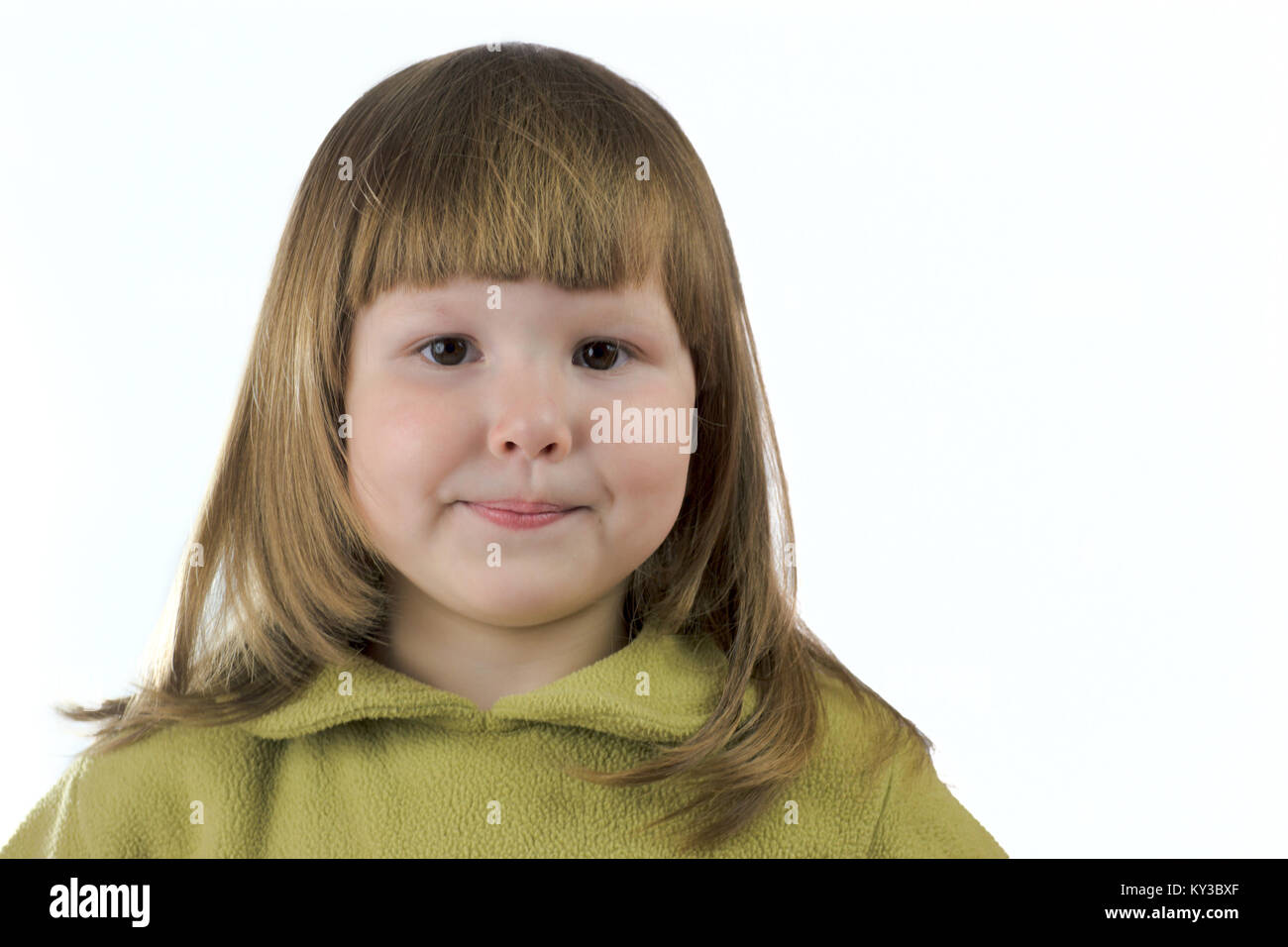 Studio portrait of a curious shy little girl isolated on white Stock ...