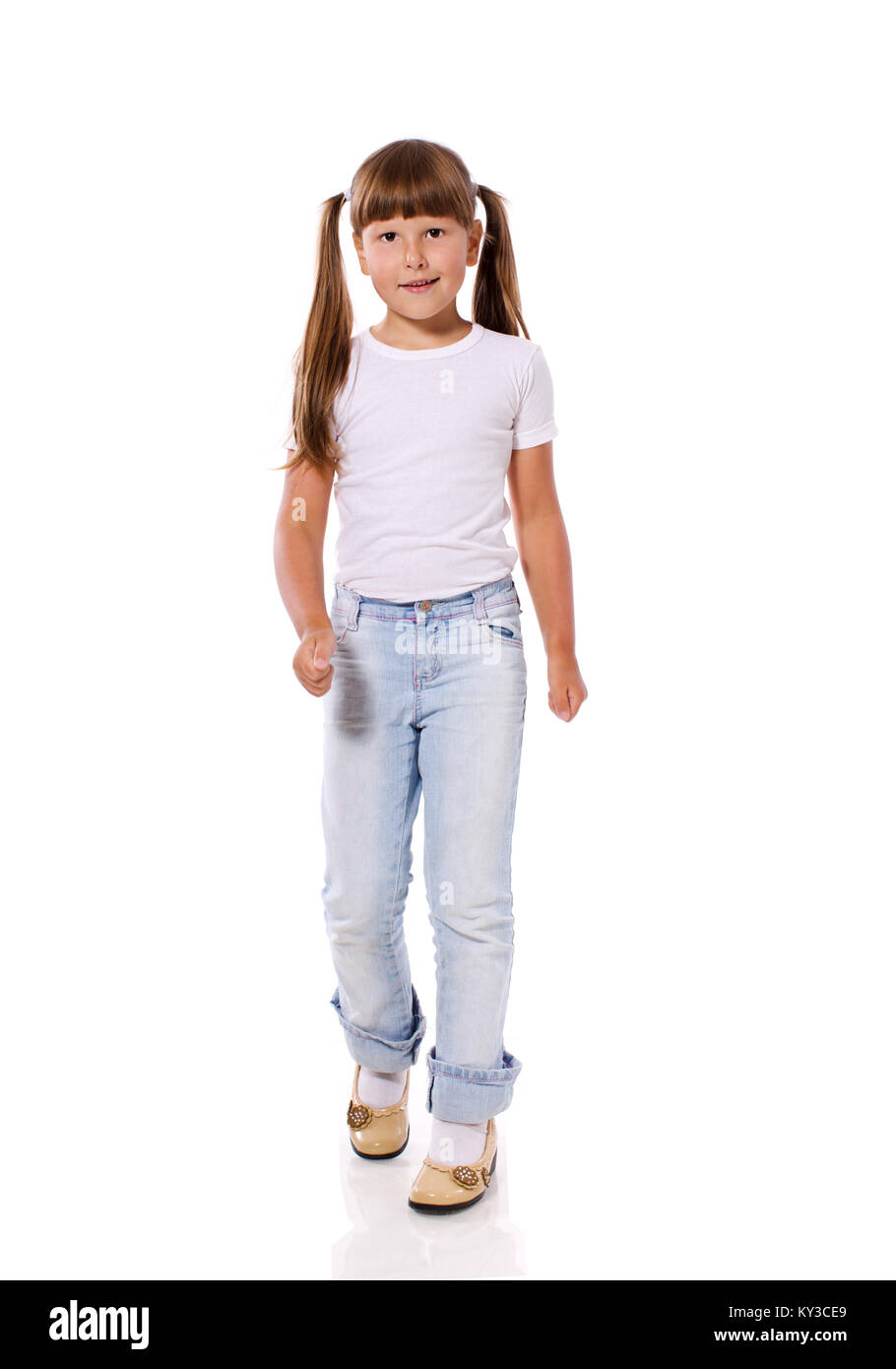 Happy excited walking girl isolated on white Stock Photo - Alamy