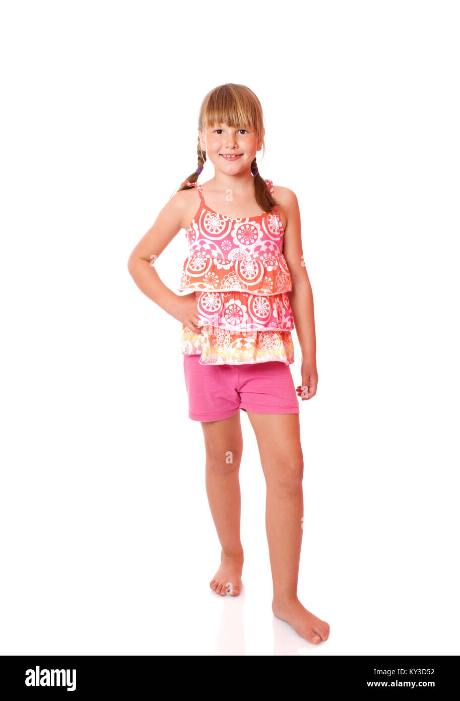 Happy smiling seven years girl standing isolated on white Stock Photo ...