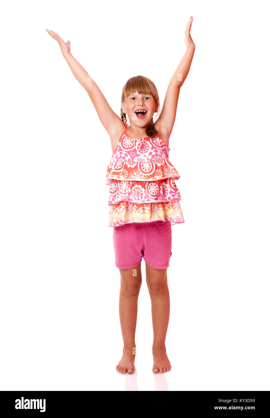 Happy shouting seven years girl standing excited isolated Stock Photo ...