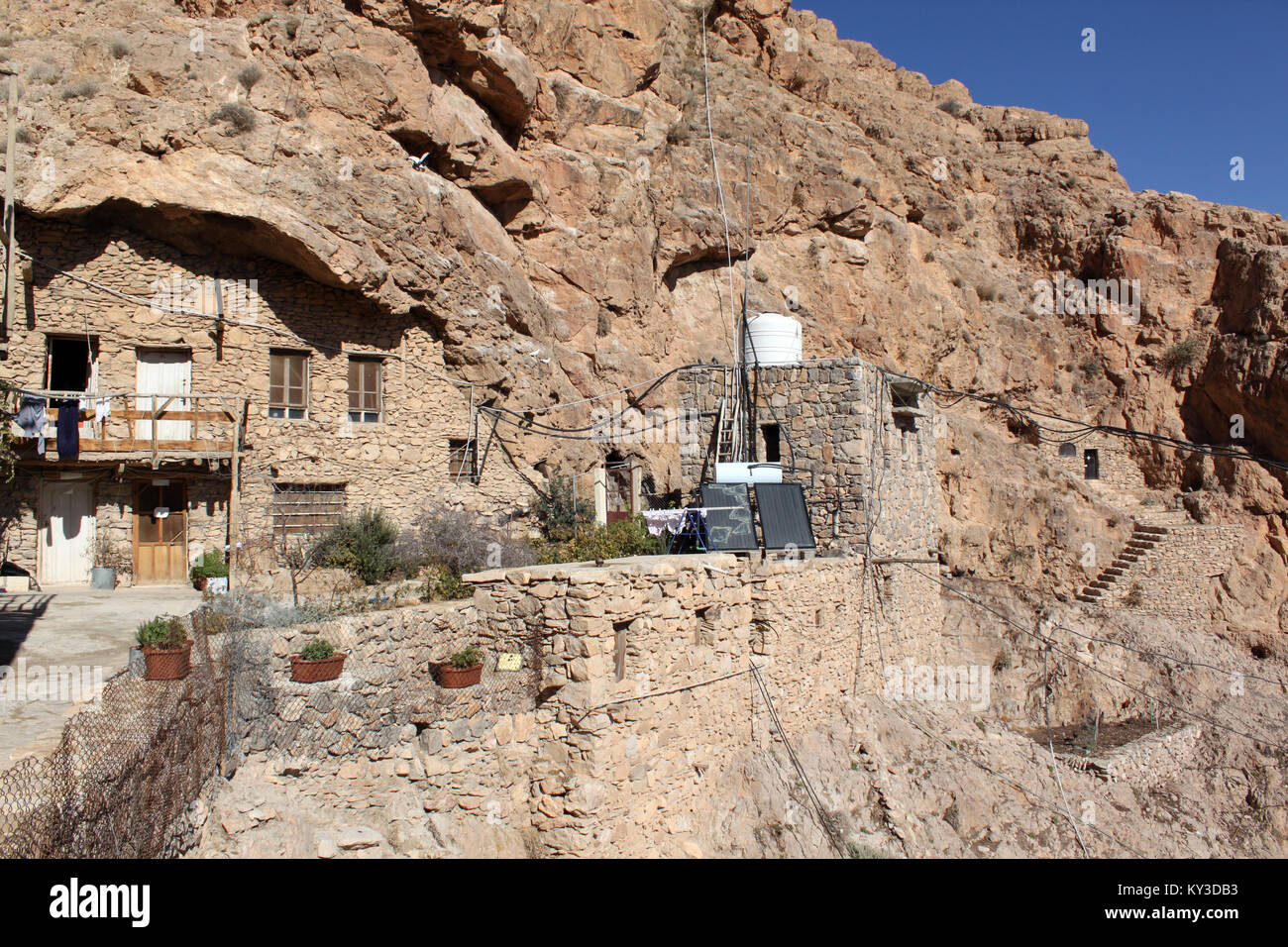 Stone buildings for the monks in monastery Mar Musa, Syria Stock Photo ...