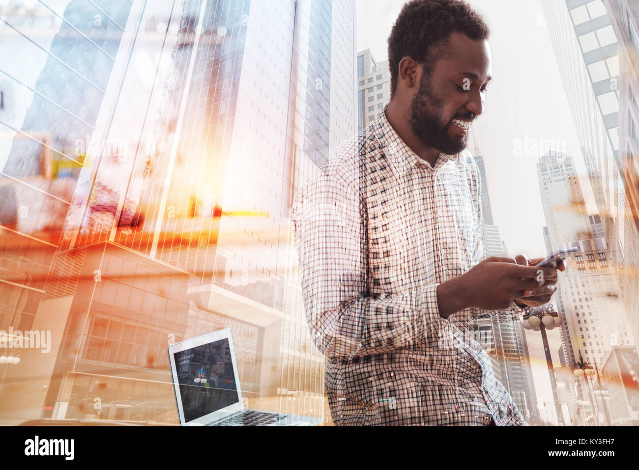 Attentive male person typing message Stock Photo - Alamy