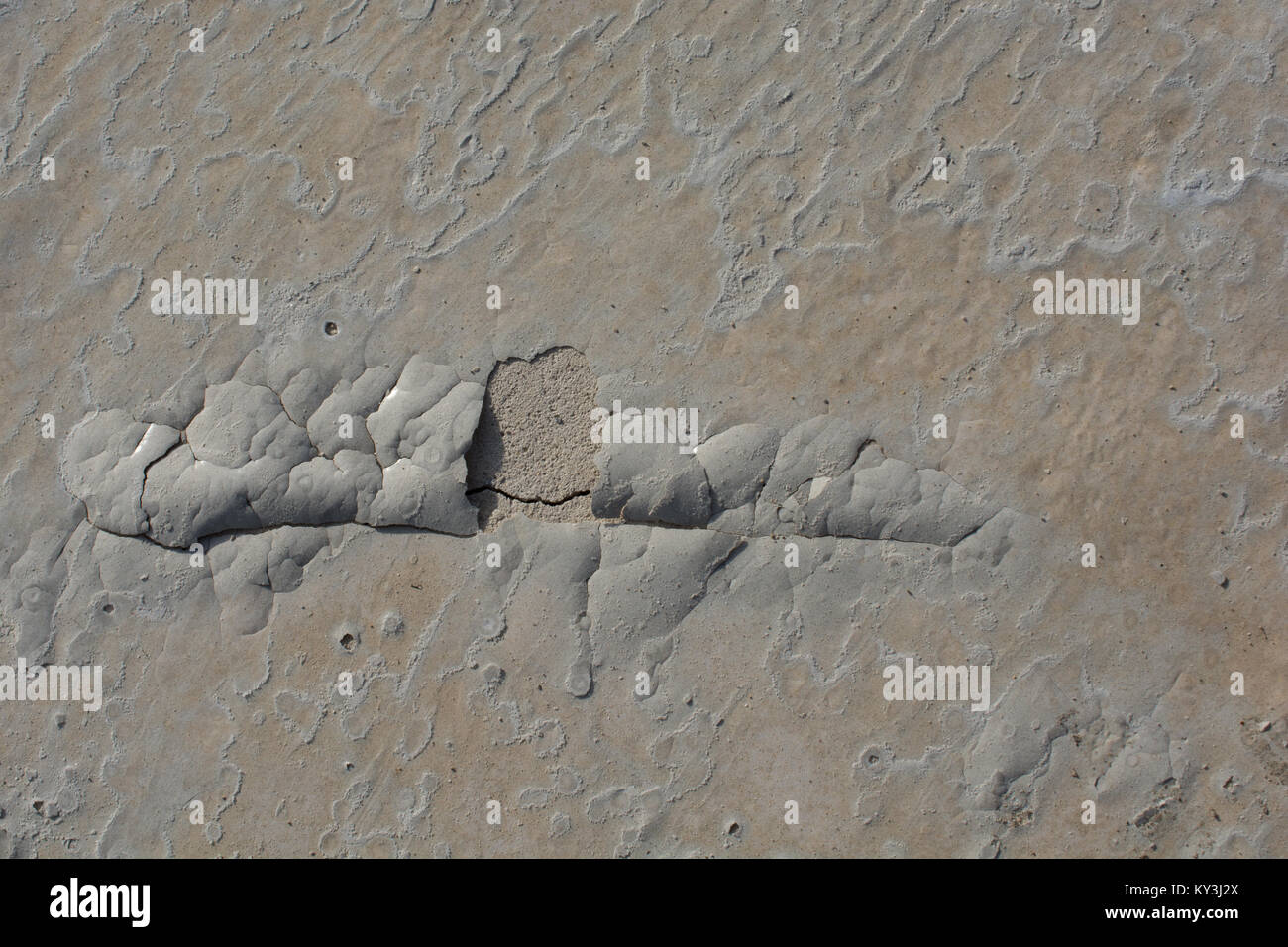 Patterns on a freshly poured concrete surface Stock Photo - Alamy