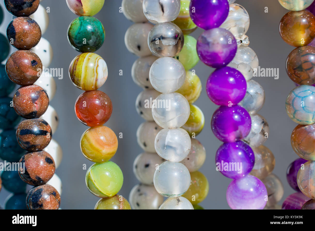 Beautiful colorful beads of various type and color Stock Photo - Alamy