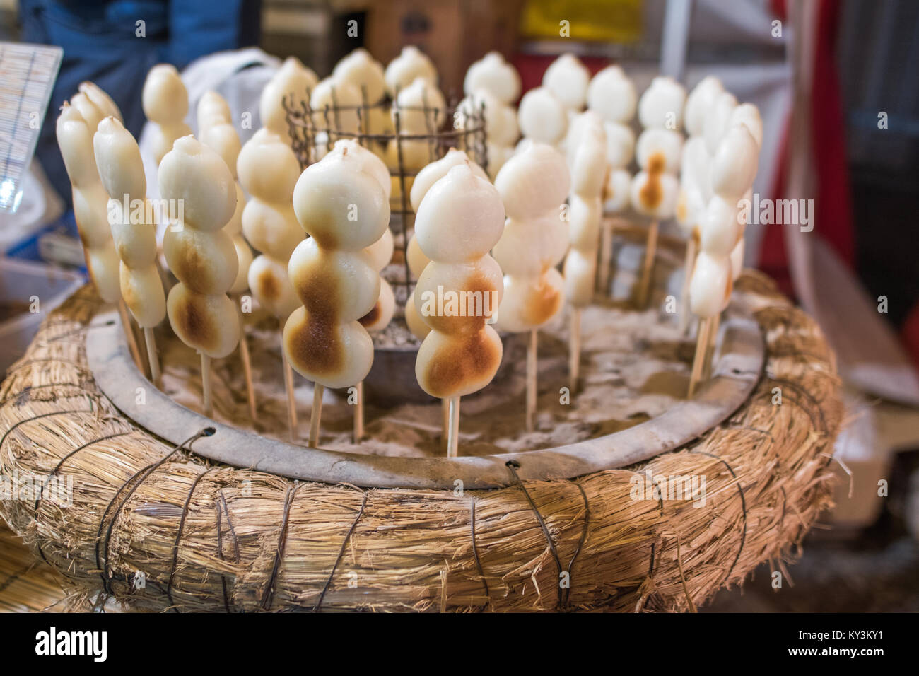 rice ball dango stick charcoal grill put in hay Stock Photo - Alamy