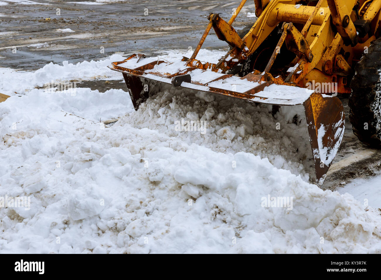 Snow cleaning process in winter in the city Cleaning road from snow ...