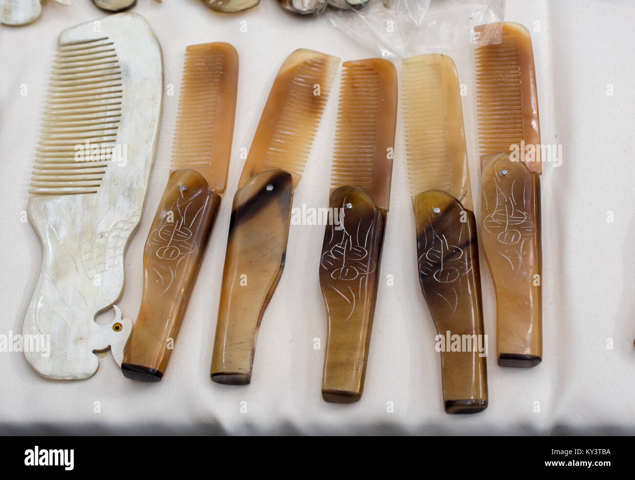 Set of brand new hand made horn comb Stock Photo - Alamy