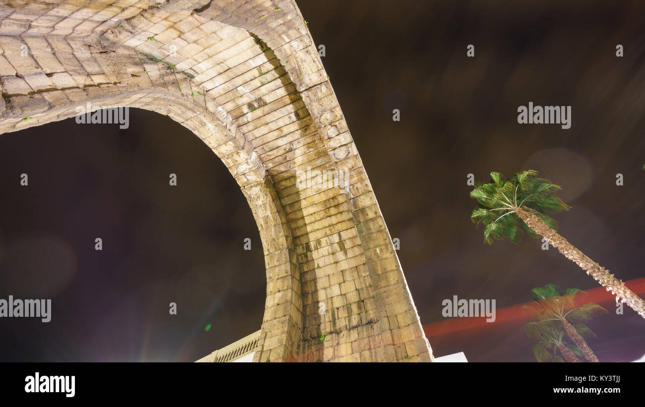 Bottom view of Trajano Arch in Merida Stock Photo - Alamy