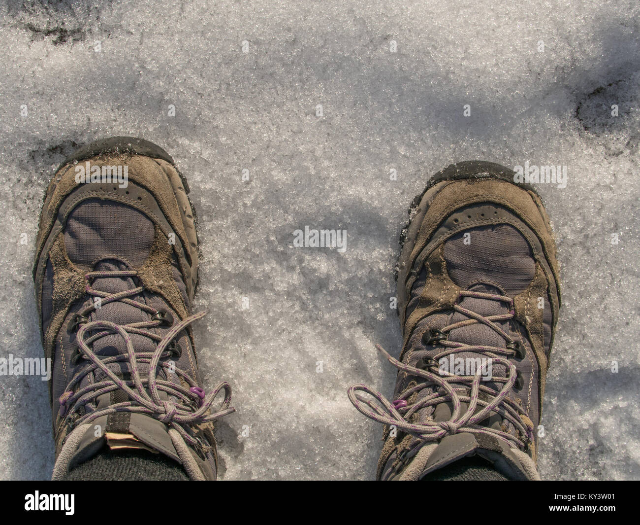 Trekking shoes on the snow. Winter Stock Photo - Alamy