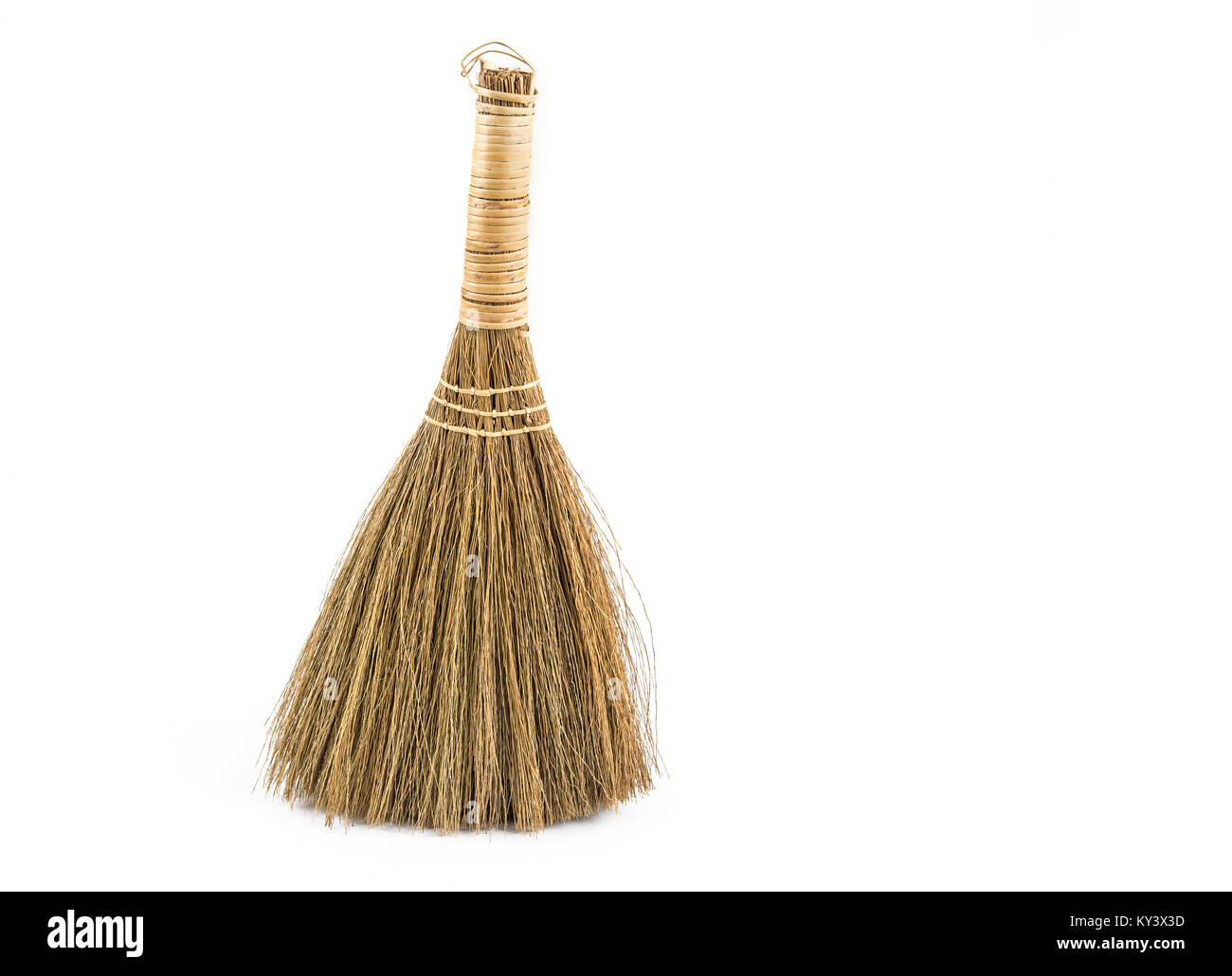 Small hand broom for household cleaning on the white Stock Photo - Alamy