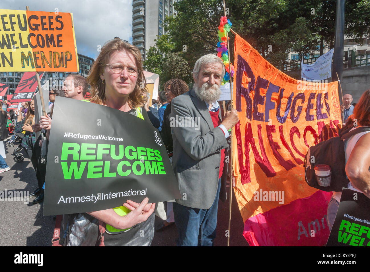 Amnesty International poster and banner at the Park Lane rally before ...
