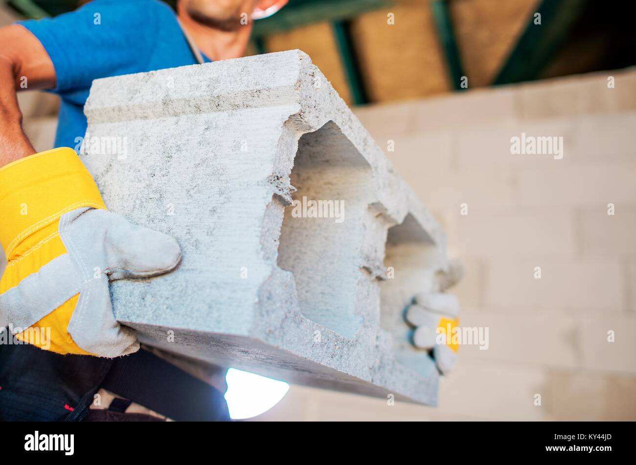 Home Builder with the Concrete Block. Caucasian Construction Worker ...