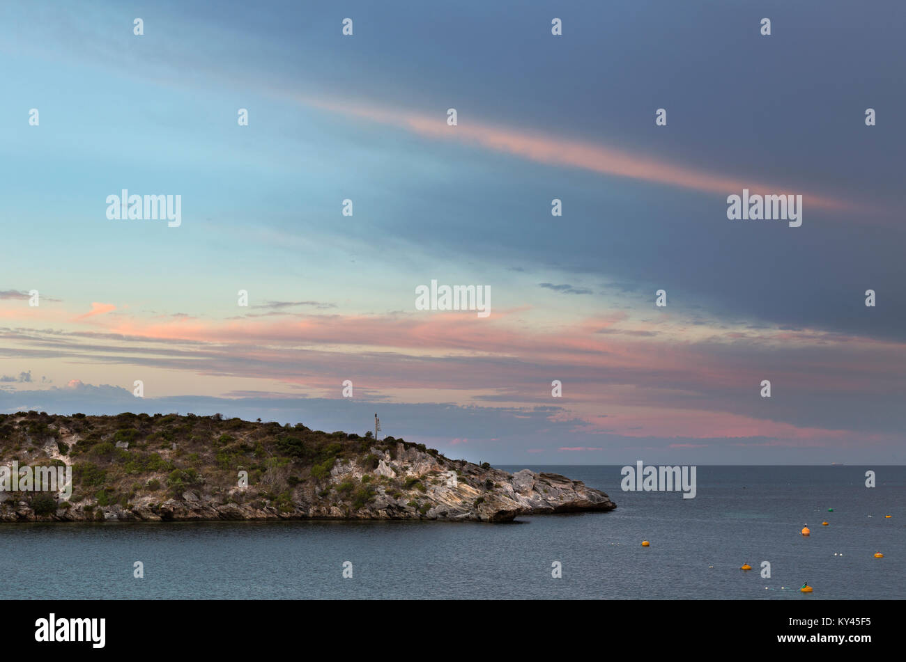 A colourful sunset over Longreach Bay, Rottnest Island, Perth, Western ...