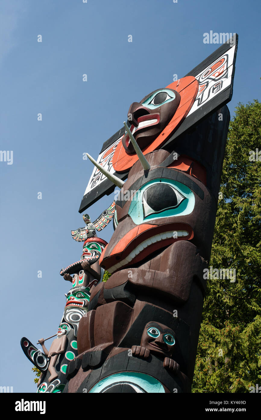 First Nations totem poles representing craftsmanship and unique culture of indigenous people ...