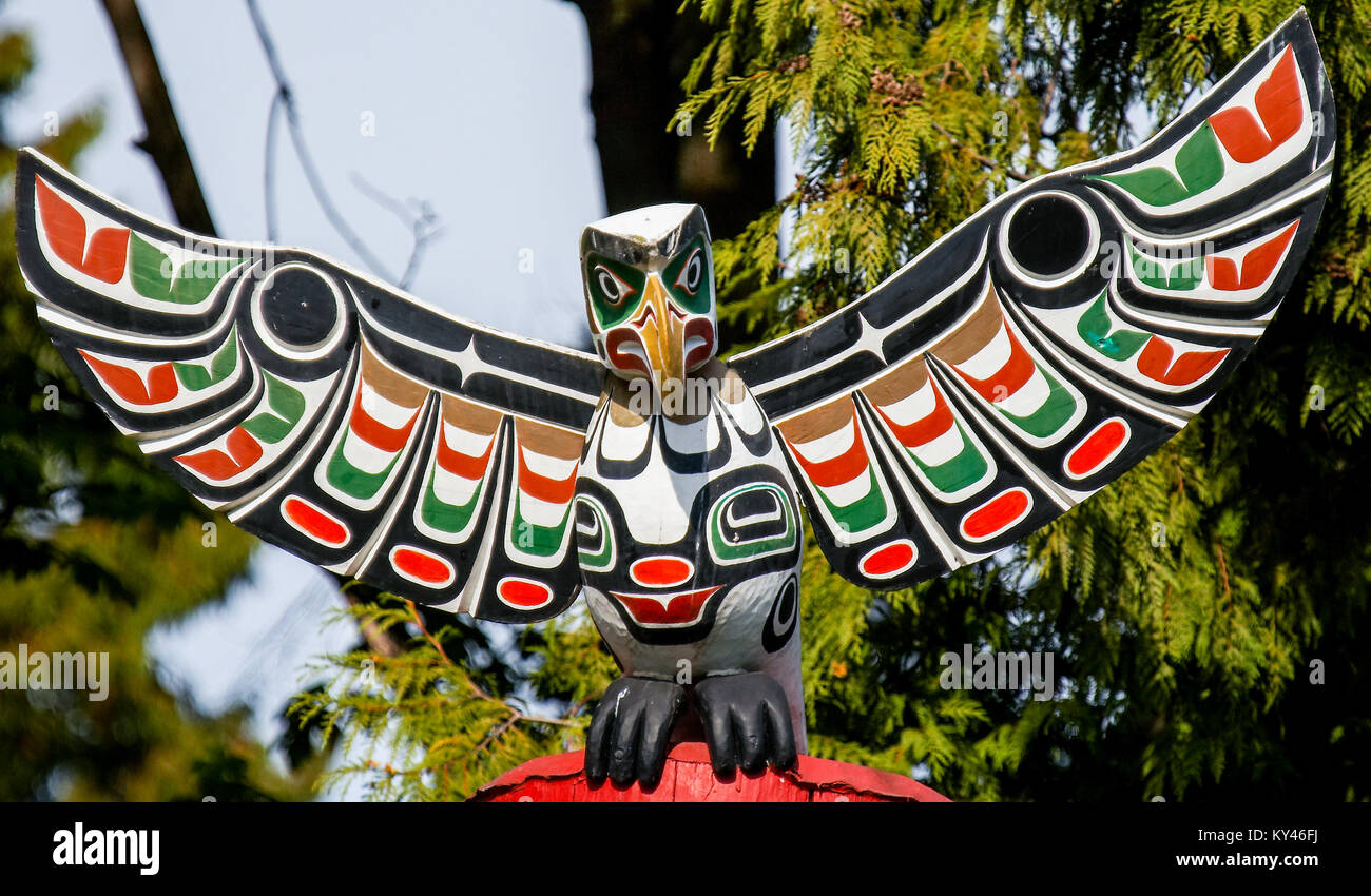 First Nations totem poles representing craftsmanship and unique culture of indigenous people ...