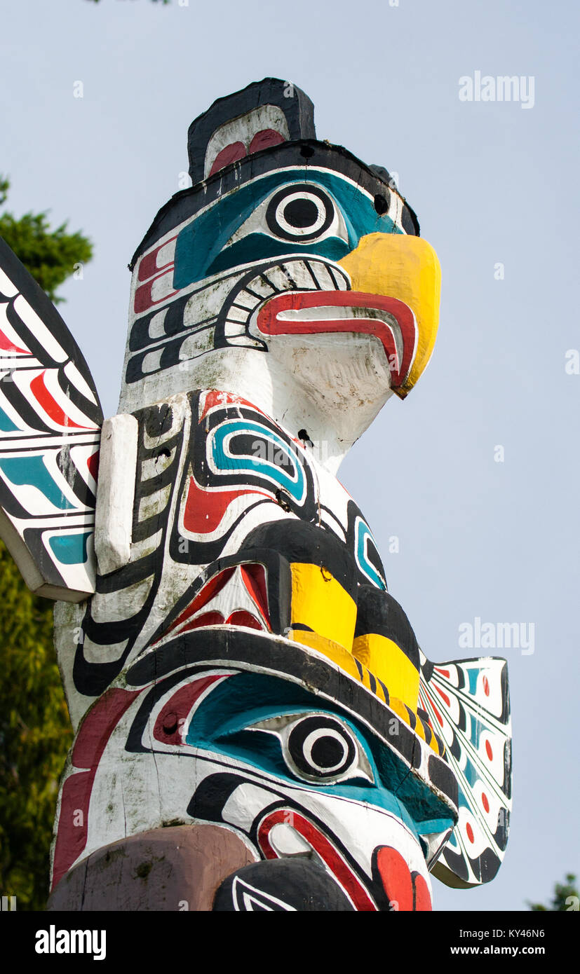 First Nations totem poles representing craftsmanship and unique culture of indigenous people ...