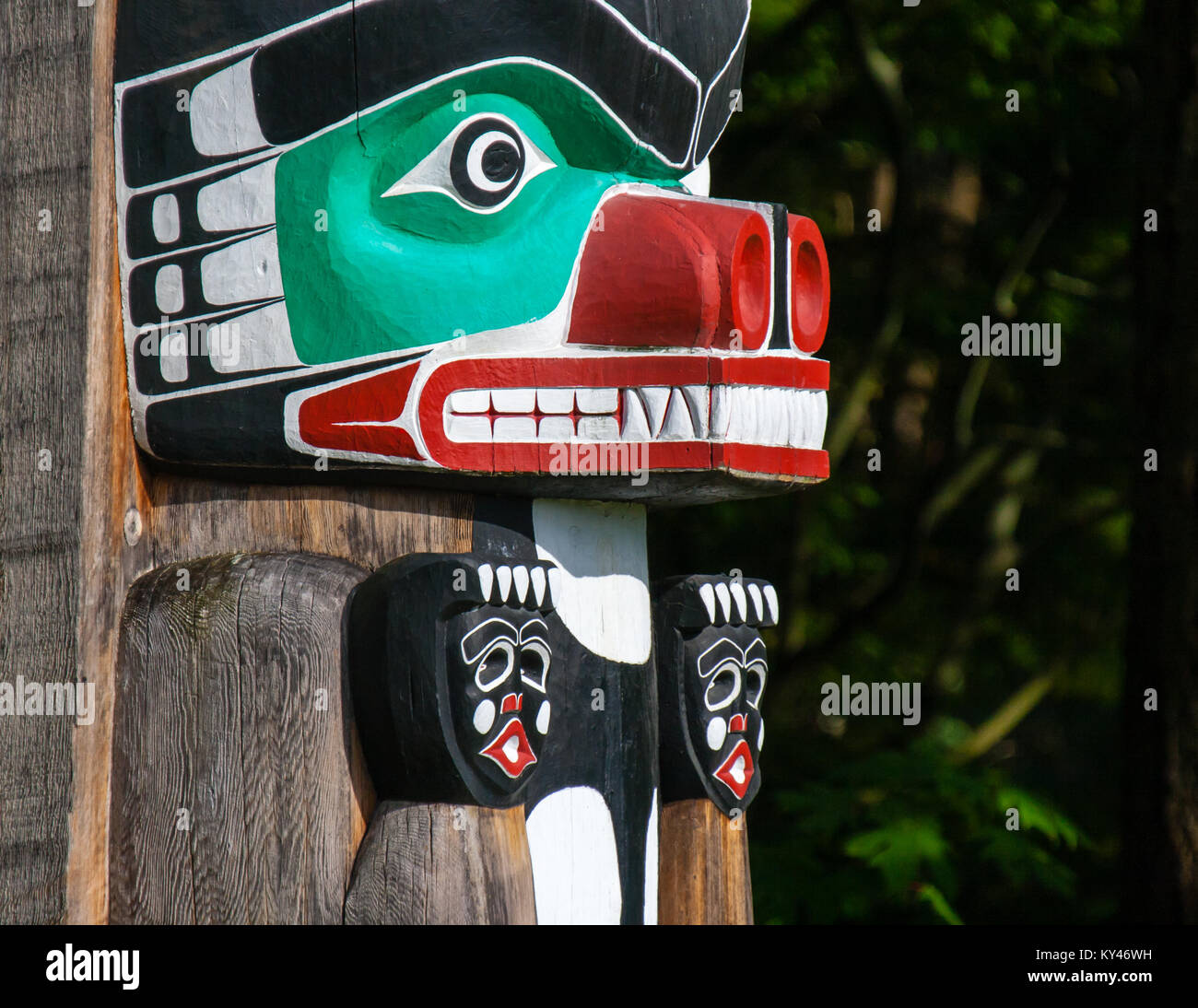 First Nations totem poles representing craftsmanship and unique culture of indigenous people ...