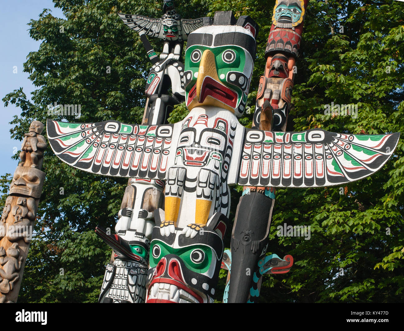 First Nations totem poles representing craftsmanship and unique culture ...