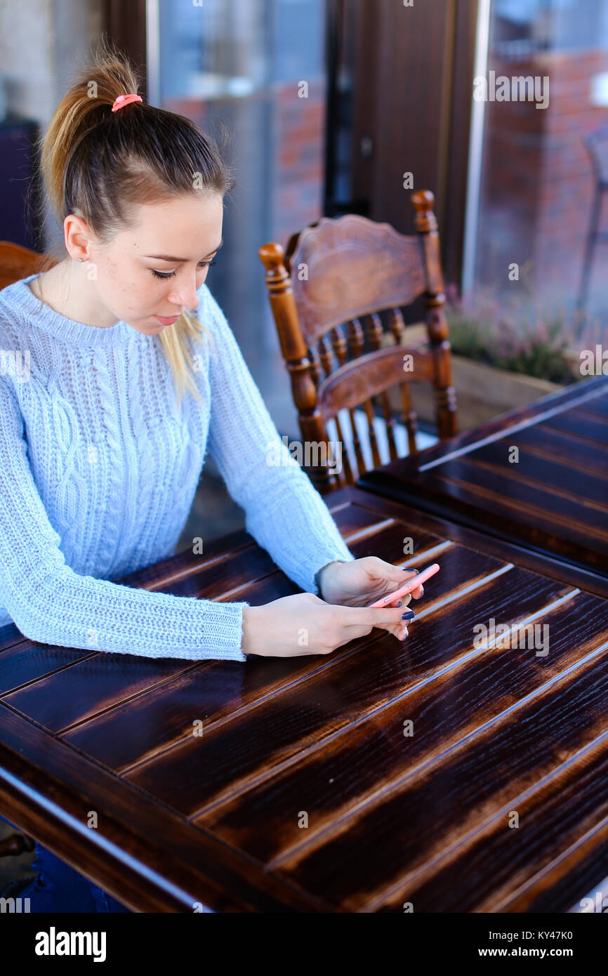 Model waiting photographer for photoshoot in cafe Stock Photo - Alamy