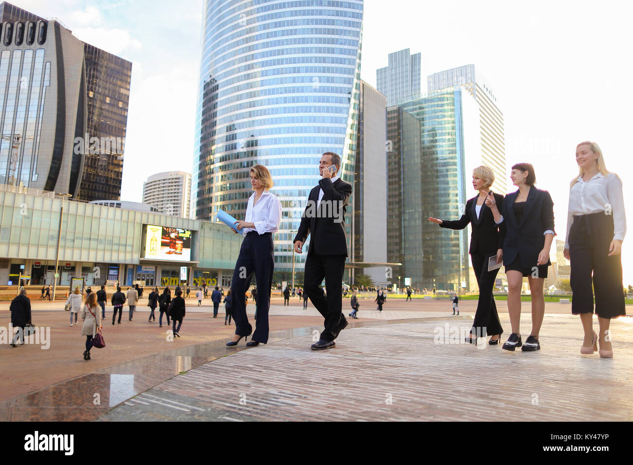 Employees of business corporation passing in and talking by sm Stock ...