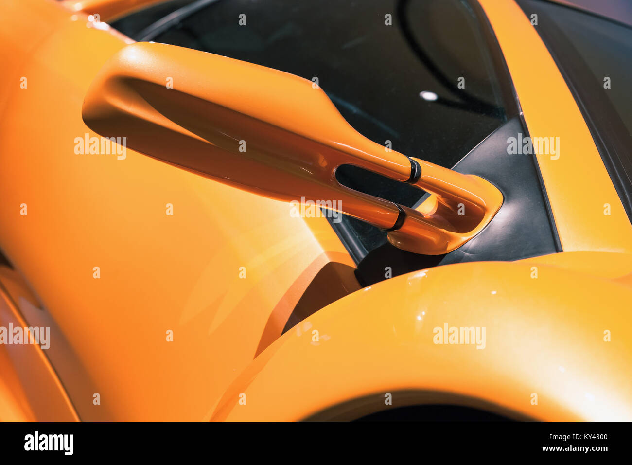 Luxury yellow sports car mirror, close up photo Stock Photo - Alamy
