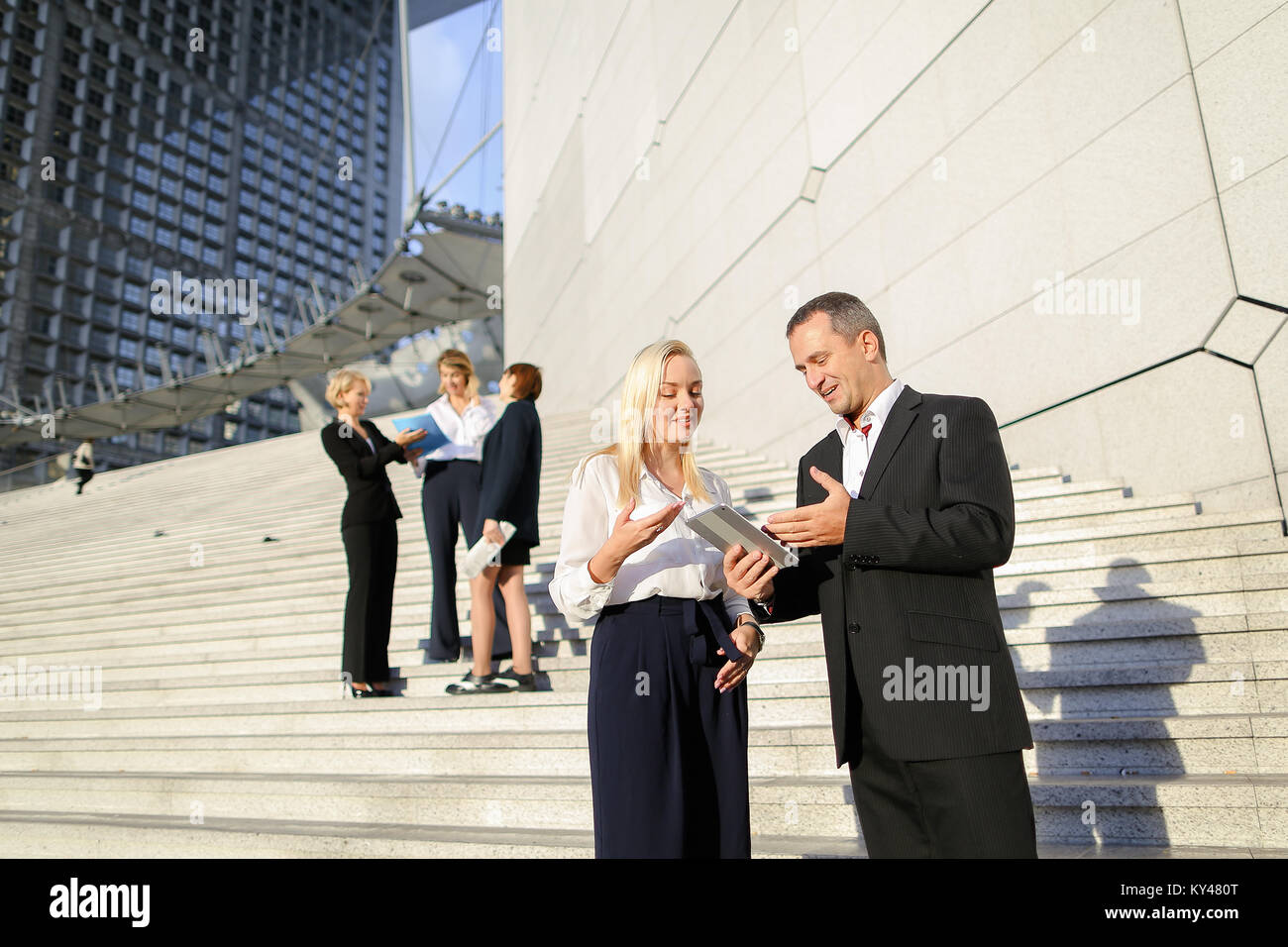 Foreign business colleagues in official journey talking and keep Stock ...