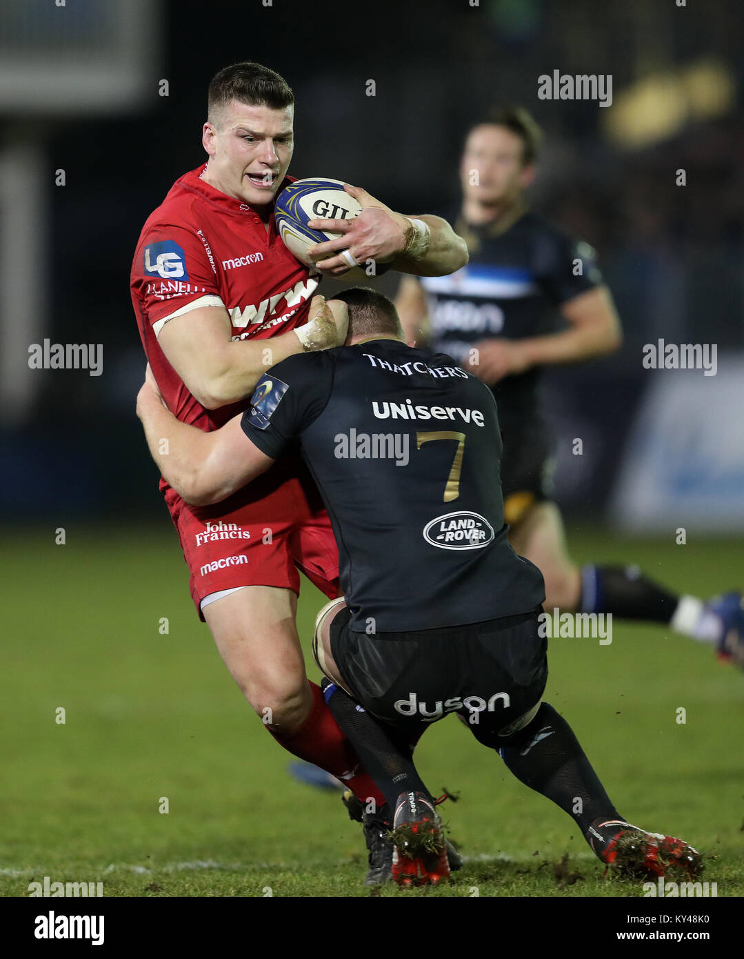 Llanelli Scarlets Scott Williams is tackled Bath's Sam Underhill by ...