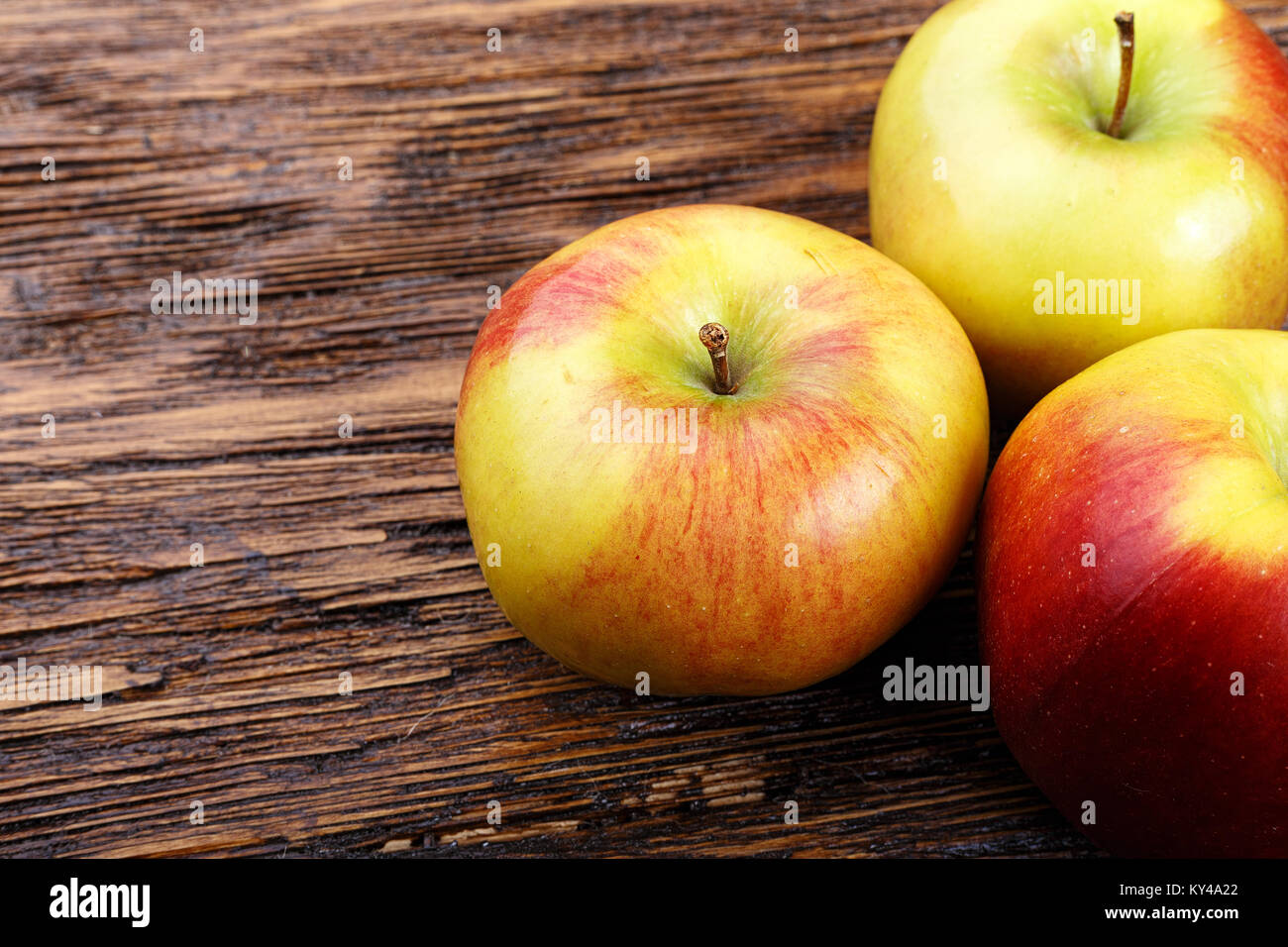 ripe apples on a wooden table, summer harvest, healthy eating. Space ...