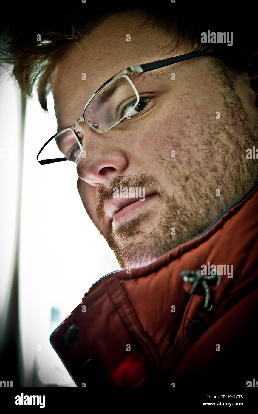 portrait of bespectacled young man Stock Photo - Alamy