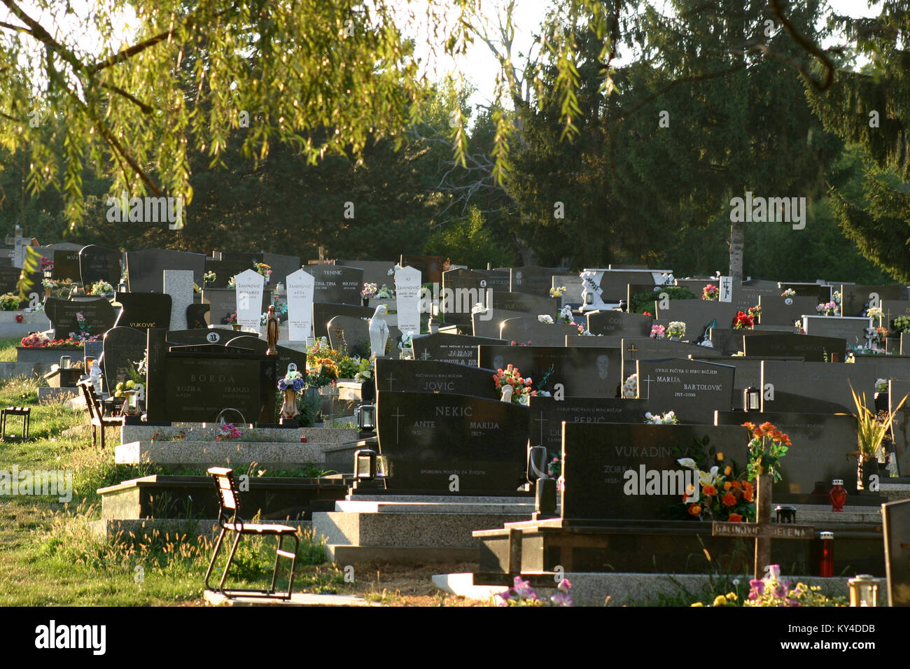 Tomb stones in Catholic Croatian cemetery Stock Photo - Alamy