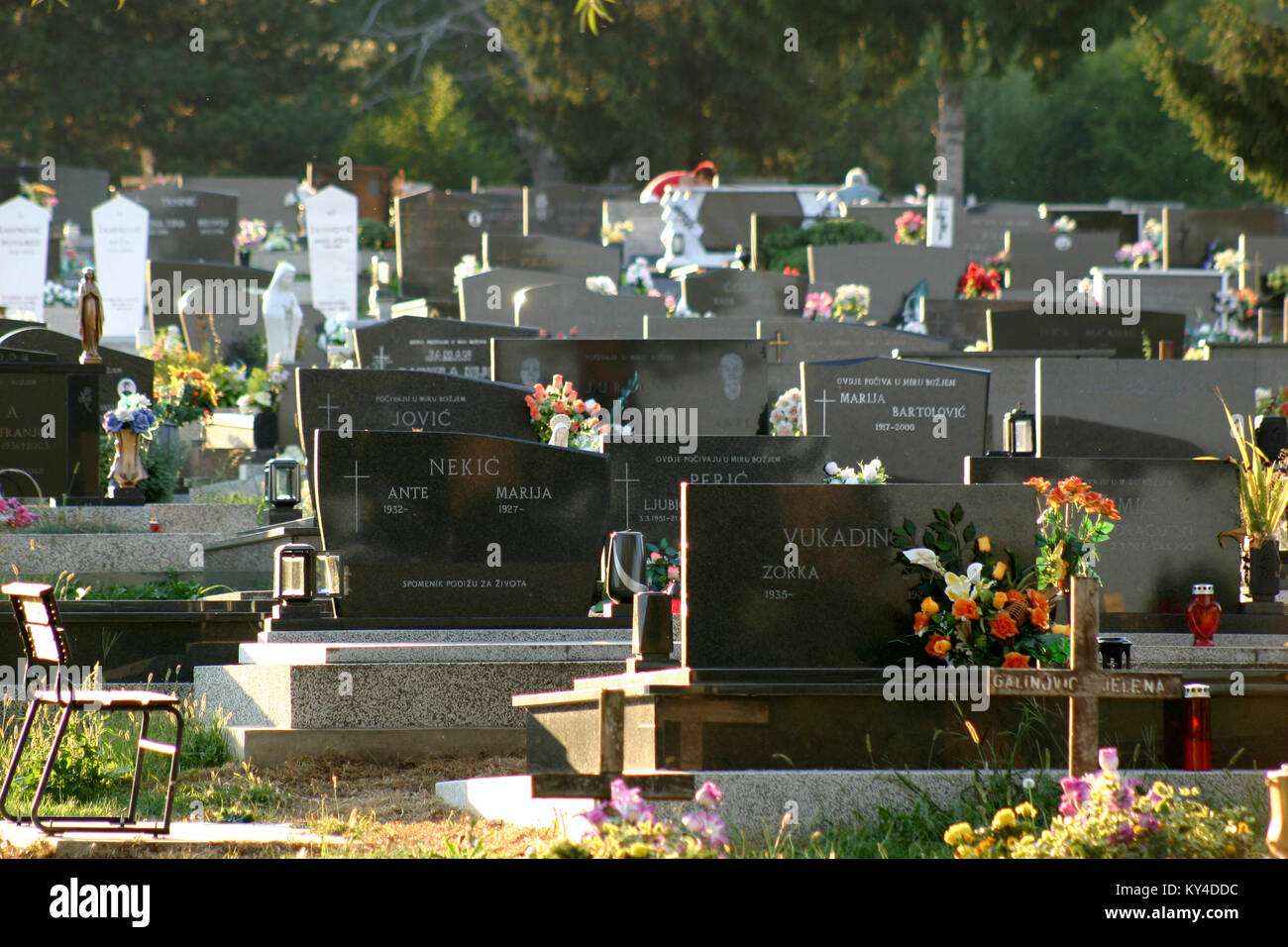 Tomb stones in Catholic Croatian cemetery Stock Photo - Alamy