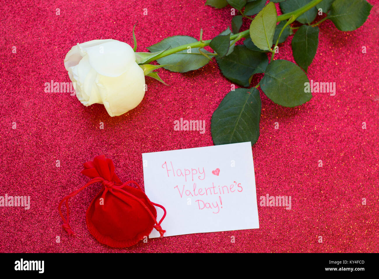 Valentine's concept with a white rose Stock Photo - Alamy