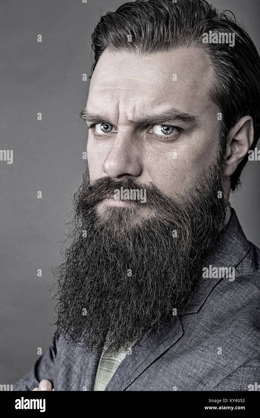 Angry man with beard hi-res stock photography and images - Alamy