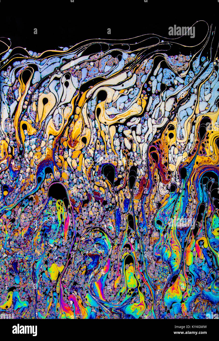 Optical thin film interference patterns in a stretched soap solution ...