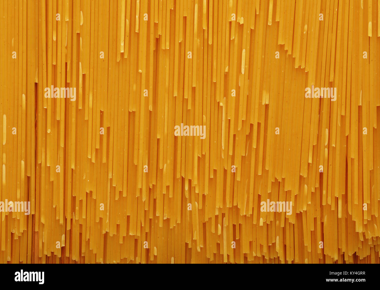 Close up background pattern of spaghetti pasta, elevated top view ...